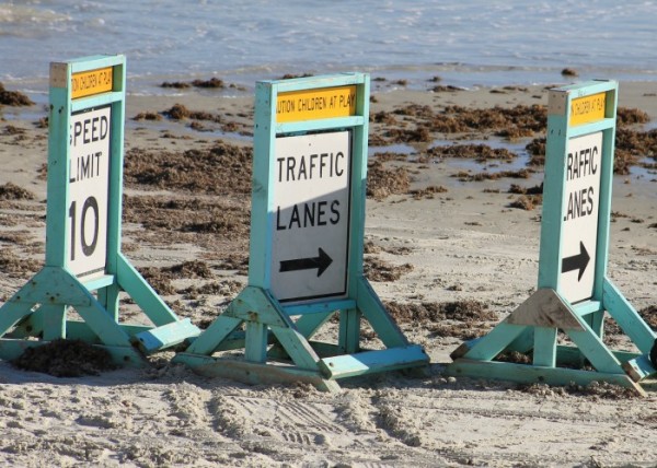 street signs on the beach